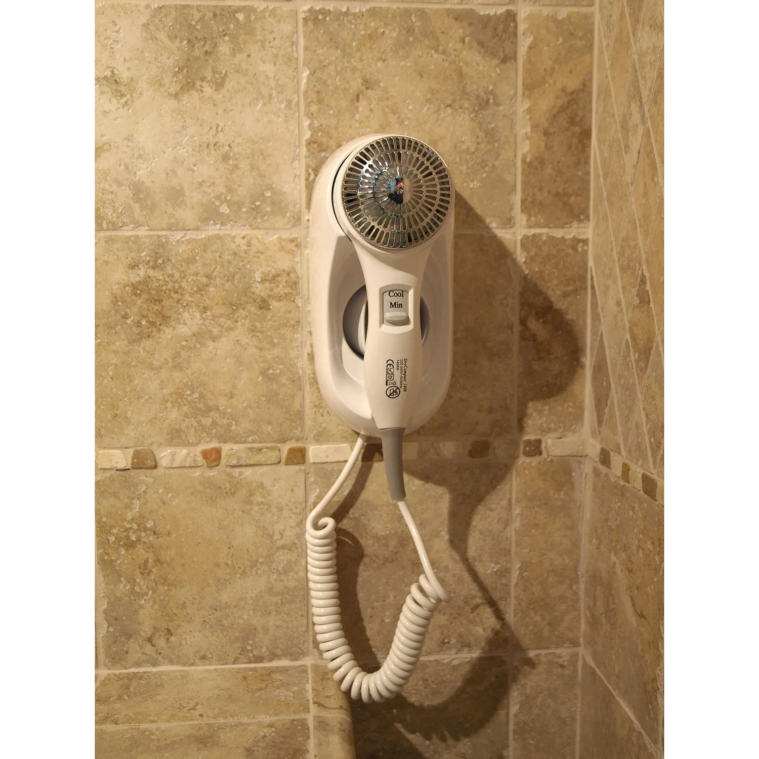 Wall mounted hair dryer for hotels Drycompact bright white color small size